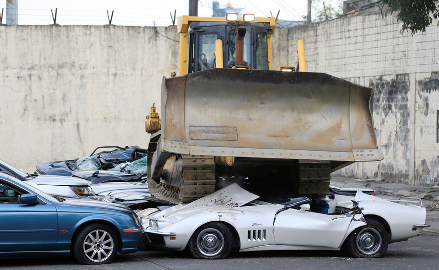 Demolition Duterte: Philippines leader bulldozes luxury cars to send ...