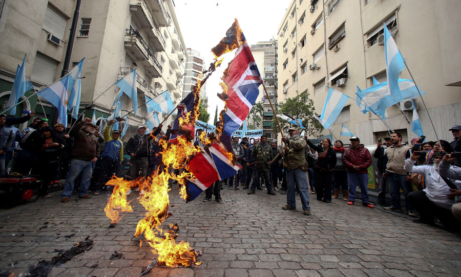 ‘The war isn't over’: Protesters burn Union Jack in fiery Falklands War ...