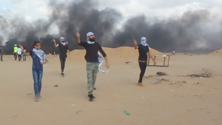 Great Dance of Return: Palestinians perform Dabke to the sound of ...