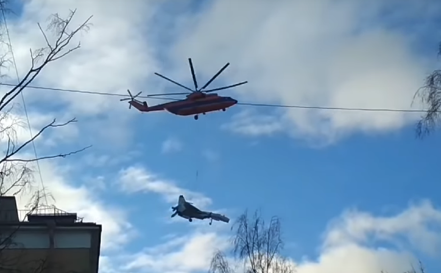 Look up in the sky! It's a bird… It’s a helicopter, carrying a military ...