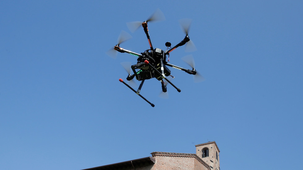 WATCH: Lock down measures see DRONES patrol streets in Italian town ...