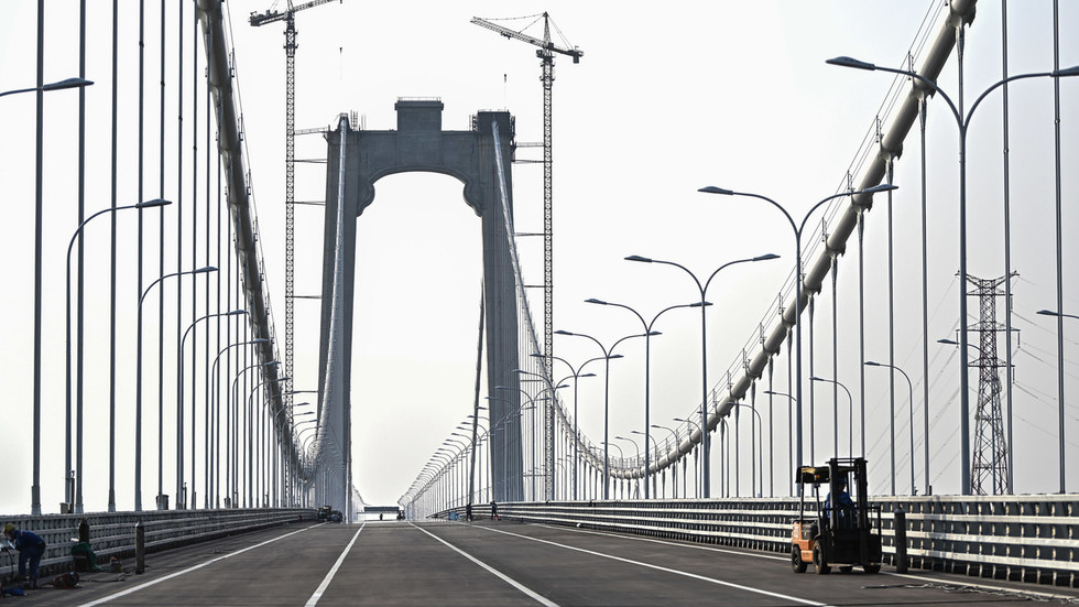 China opens world’s first suspension bridge combining high-speed rail ...