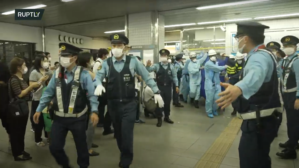 At least 10 injured during knife attack on Tokyo train, suspect ...
