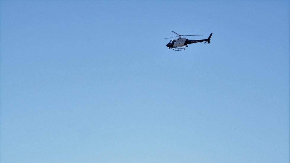 Officer killed as helicopter plunges into water — RT World News