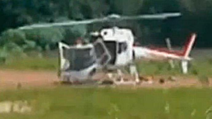 Chopper chopped: Helicopter falls apart on landing (VIDEO) — RT World News